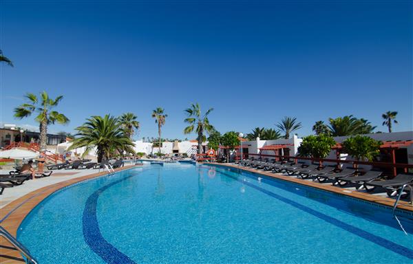 Castillo Beach Club from On The Beach. Castillo Beach Club is in Caleta ...